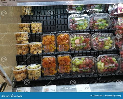 Varieties Of Imported As Well Local Fruits And Vegetables Wrapped In