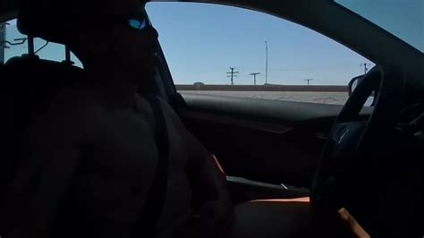 Muscular Exhibitionist Drives Naked While Masturbating