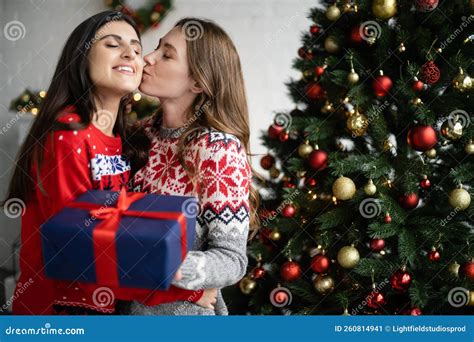 Woman In Sweater Kissing Lesbian Partner Stock Image Image Of Emotion