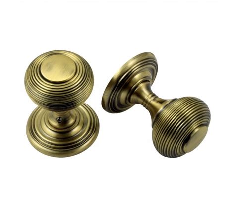 Prima Xl2030 Solid Brass Reeded Concealed Door Knobs Antique Brass And Aged Brass
