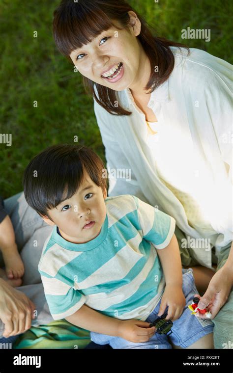 Japanese Mother And Son At The Park Stock Photo Alamy