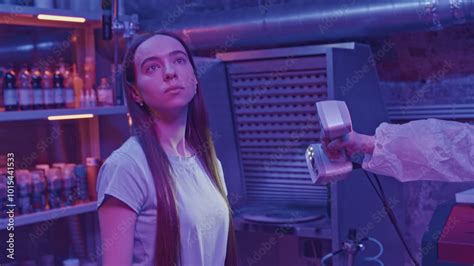 Scanning Of Young Woman For Development Media Laser Gun Scans Woman