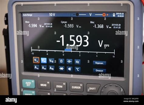 Close Up Image Of A Digital Oscilloscope Screen Displaying Voltage Measurement In Real Time The