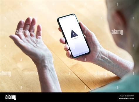 Senior Having Problem With Phone And Technology Old Woman With Error