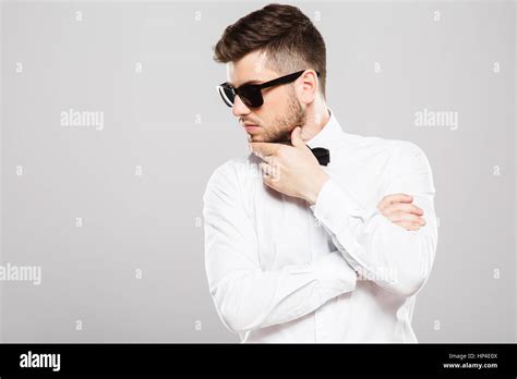 Attractive Man At Gray Background Stock Photo Alamy