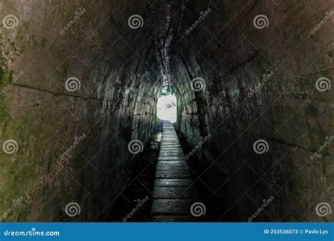 Narrow Passage In The Wall Thin Tunnel Stock Image Image Of Tunnel Passage 253536073