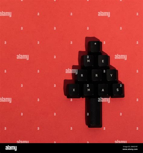 Christmas Tree Made Of Black Keyboard Keys With Merry Xmas Writing Christmas Minimal Concept