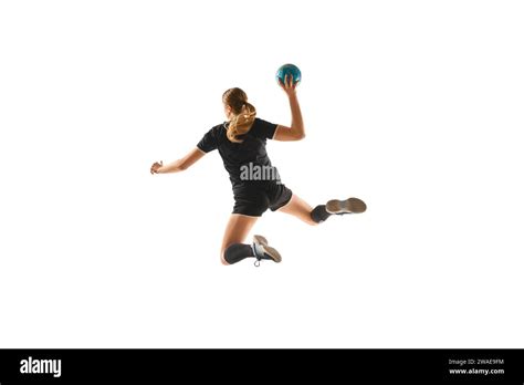 Active Female Handball Player Demonstrating Throwing Techniques Captured In Dynamic And