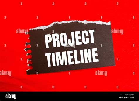 Project Timeline Message Written On Ripped Torn Black Paper Piece With Red Background