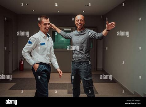 Security Guard Making Body Searching Procedure On Man For Finding Hidden Objects Before Entering