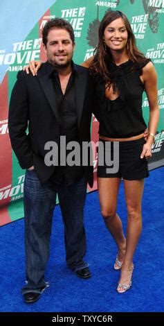 Director Brett Ratner And His Girlfriend Alina Pusau Arrive For The