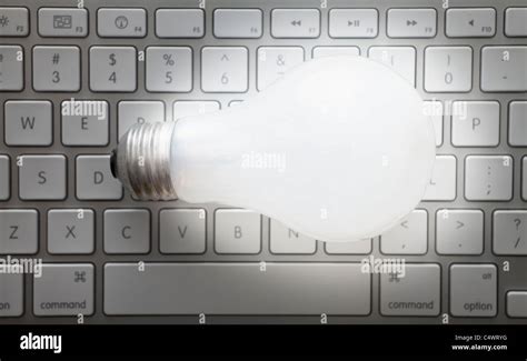 Light Bulb On Keyboard Stock Photo Alamy