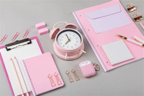 Free Photo High Angle Notebook And Clock Assortment