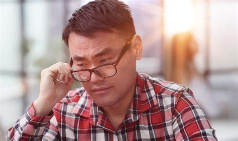 Premium Photo Portrait Of A Successful Asian Software Engineer Working On A Laptop At His Desk