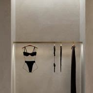 AIA Estúdio designs cave like interior for clothing store in Rio de Janeiro