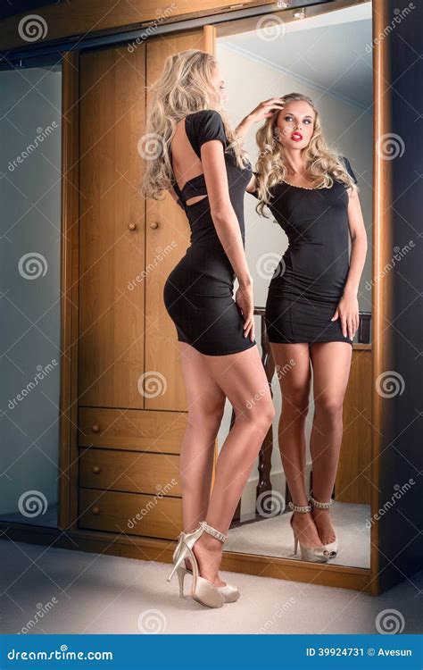 Young Woman Looking In Mirror Stock Image Image Of People Interior