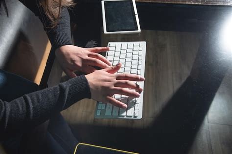 premium photo caucasian female hands typing in computer keyboard