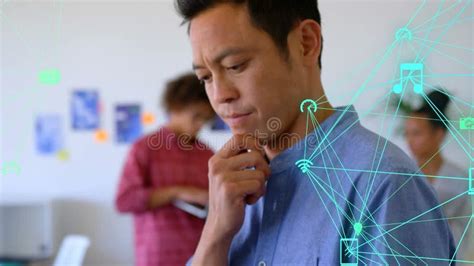 animation of connections with icons over asian businessman in office