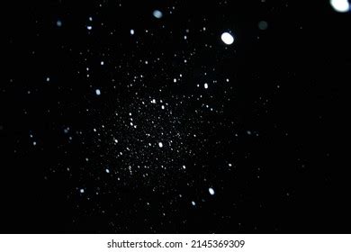 Falling Snow Particles On Black Background Stock Photo Shutterstock