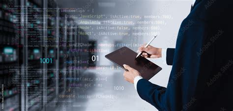 Computer Programmer Working On Big Data And Computer Code In A Data Center Or Server Room Data