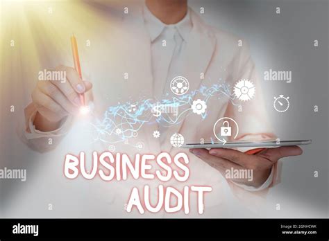 Hand Writing Sign Business Audit Business Overview Examination Of The Financial Report Of An