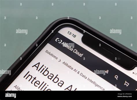 logo of alibaba cloud seen in its website on iphone alibaba cloud