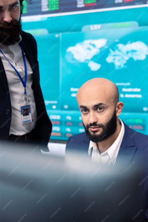 Free Photo Financial Analyst Works On Resource Allocation Plans With His Staff