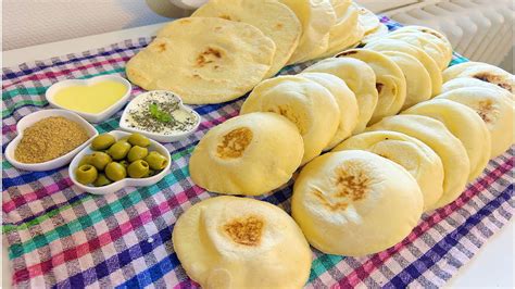 طريقة عمل خبز عربي منزلي بحجم رغيف صغير للساندويتشات وحجم رغيف كبير