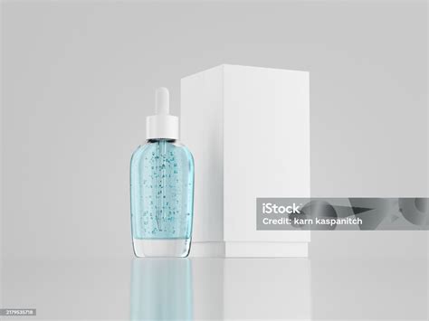 물방울 모양의 혈청 병 및 종이 상자 모형 깨끗한 배경에 서있는 평평한 타원형 스포이드 병 50ml 액체 피펫 스포이드 화장품 포장 및 직사각형 상자의 3d 렌더링 팩 샷