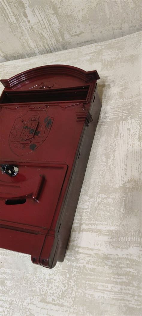 Rectangular Mailbox For Correspondence Plastic Dark Red Plastic Box With The Emblem Of