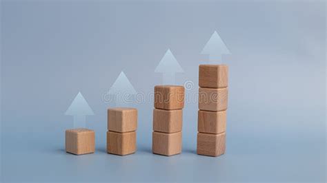 a stack of wooden blocks with a blue background and an arrow pointing
