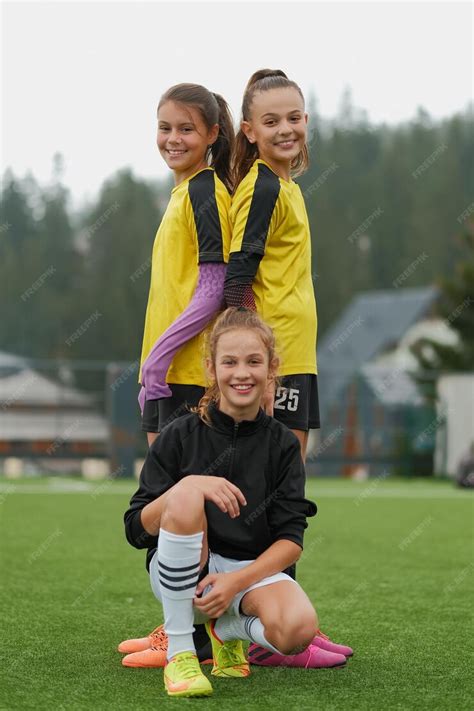 Premium Photo A Portrait Of A Happy Female Soccer Team Together On The Stadium Field