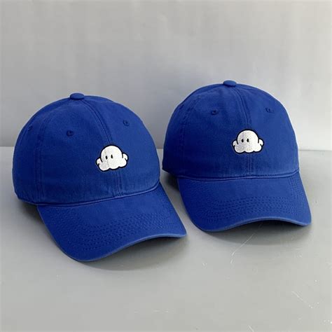 파란모자에 귀여운 캐릭터 로고 자수 모자