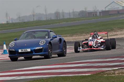 Opposites Attack Porsche 911 Turbo S Vs F4 Race Car