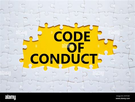 Code Of Conduct Symbol White Puzzle With Words Code Of Conduct Beautiful Yellow Background