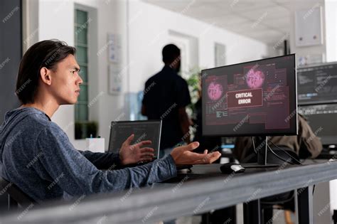 Premium Photo Web Developer Doing I Don T Know Gesture While Having Web Server Hacked Looking