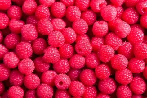 Premium Photo Vibrant Raspberry Red Background For Sweet Designs