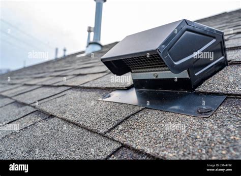 Static Vent Installed On A Shingle Roof For Passive Attic Ventilation