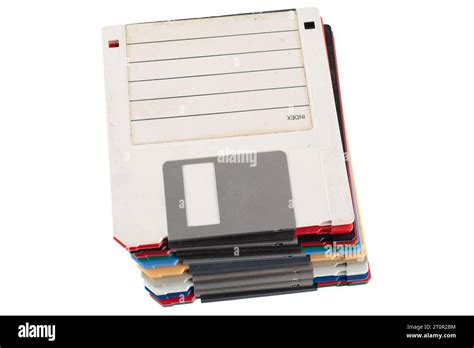 Colored Old Retro Floppy Diskettes In Stack Isolated On White