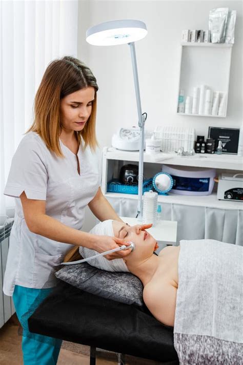 Woman Receiving Electric Facial Massage Vacuum Massage For Lifting