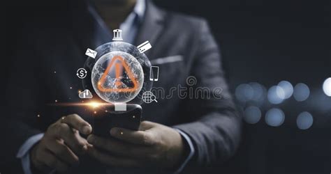 Businessman Using Smartphone With Red Triangle Caution Warning Sign For Notification Error From