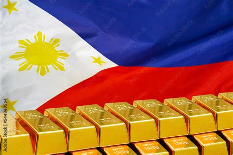 Row Of Shining Golden Bullions On The Philippines Flag Background Business And Financial