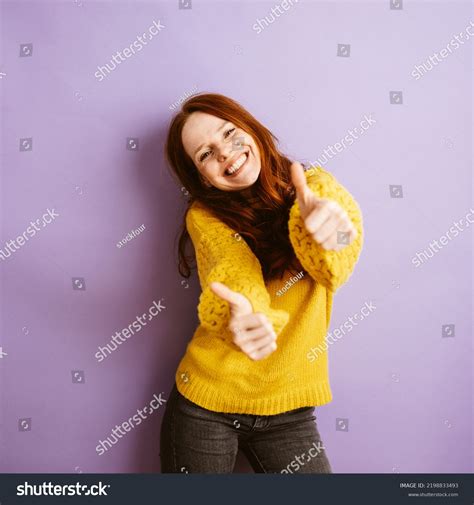 Enthusiastic Redhead Woman Showing Two Thumbs Stock Photo Shutterstock