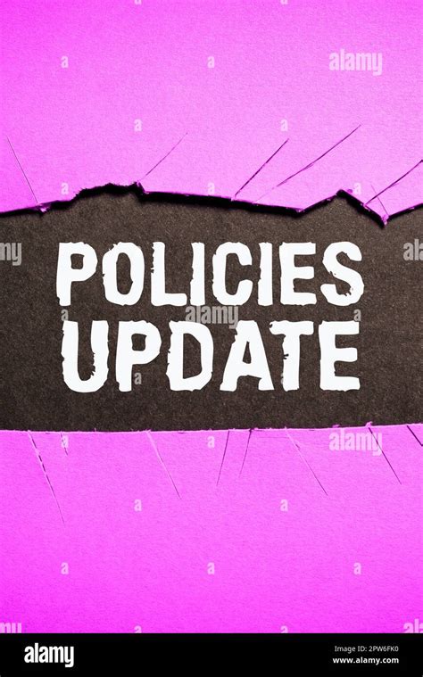 Hand Writing Sign Policies Update Business Concept Act Of Adding New Information Or Guidelines