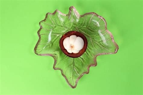 Premium Photo Purple Mangosteen Fruit Pealed Half On Translucent