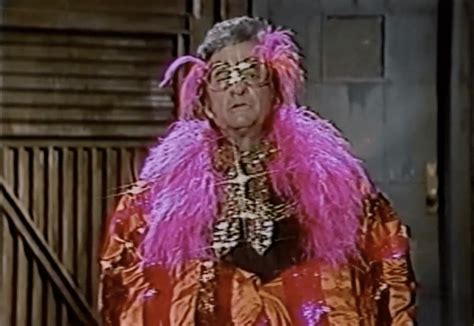 Throwback To When Johnny Cash And Elton John Switched Outfits On