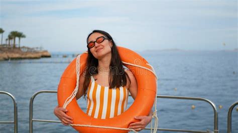 A Young Attractive Girl Lifeguard Stands On Duty Stock Image Image