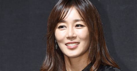 [포토엔]문정희 가슴에 단 노란리본