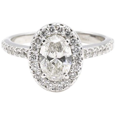 309 Carat Yellow Diamond Oval Halo Setting Engagement Ring For Sale At