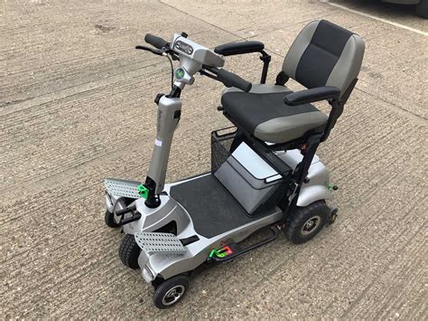 Lot 7 Quingo Flyte Mobility Scooter Together With